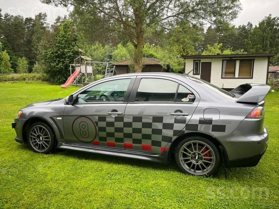 Pelēks Mitsubishi lancer-evolution 2010 Rīga, ar dzinēja tilpumu 2.00 L un nobraukumu 150 tūkst. km par 24000 €, foto 8 vietnē AUTOMOTO.COM.LV