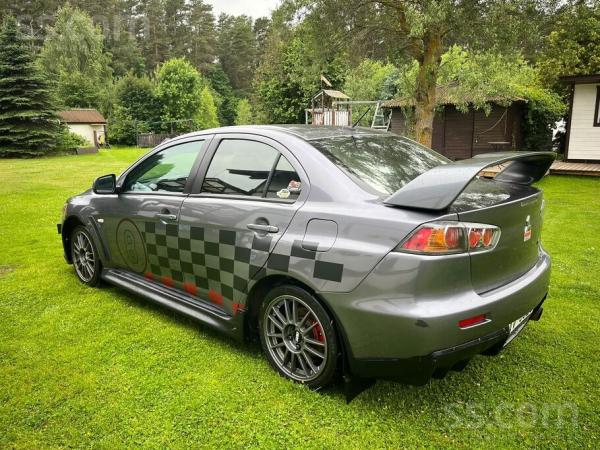 Pelēks Mitsubishi lancer-evolution 2010 Rīga, ar dzinēja tilpumu 2.00 L un nobraukumu 150 tūkst. km par 24000 €, foto 8 vietnē AUTOMOTO.COM.LV