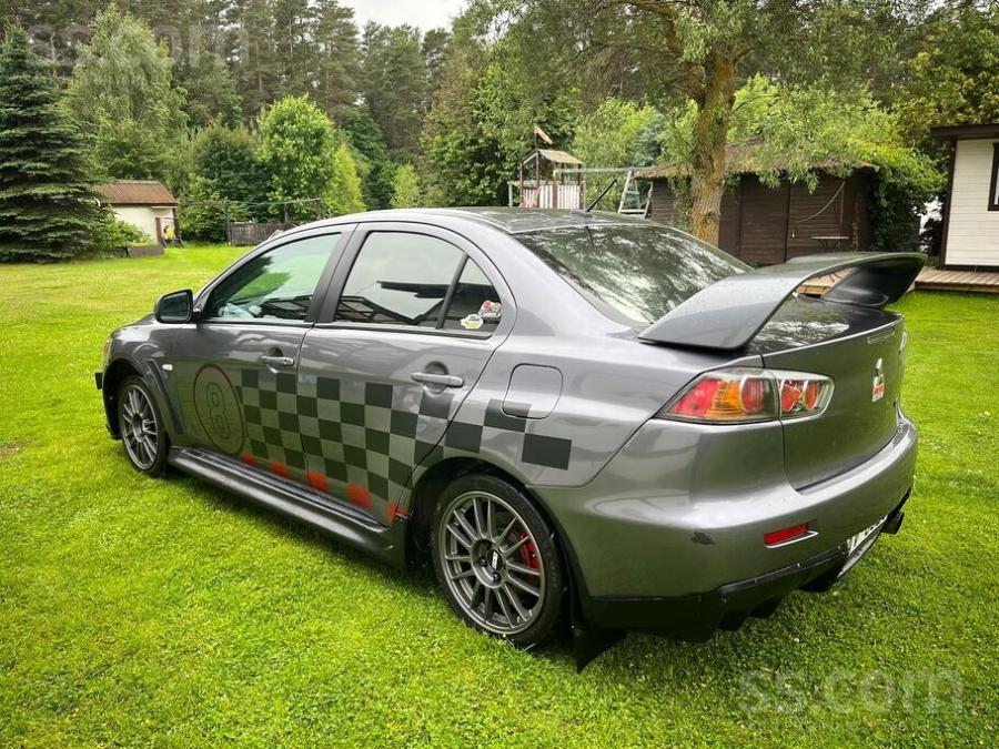Pelēks Mitsubishi lancer-evolution 2010 Rīga, ar dzinēja tilpumu 2.00 L un nobraukumu 150 tūkst. km par 24000 €, foto 9 vietnē AUTOMOTO.COM.LV