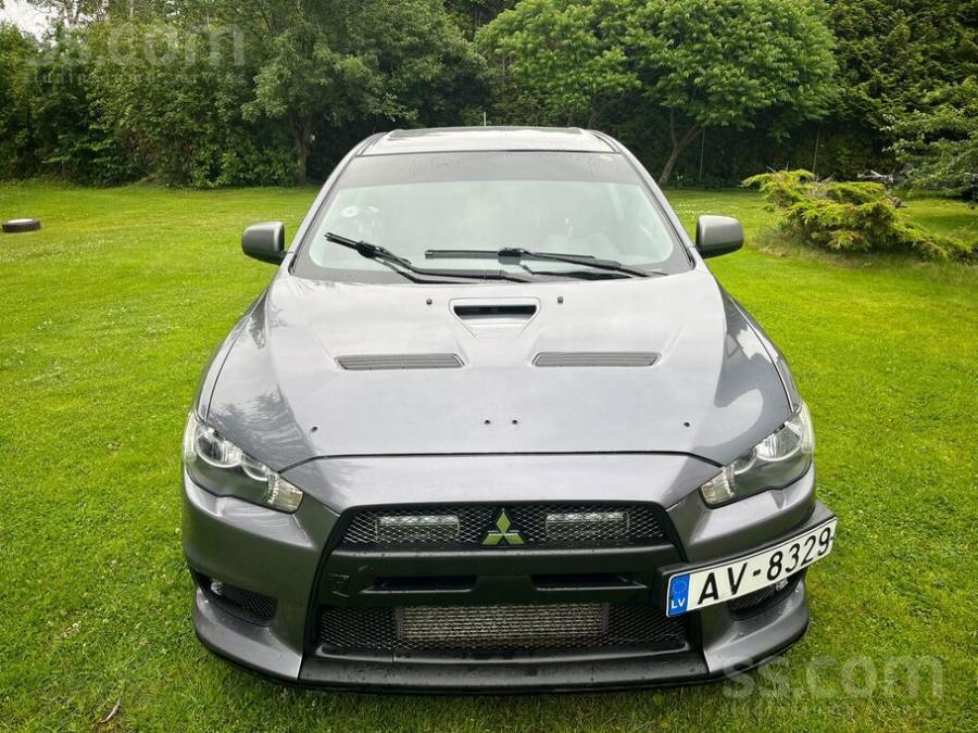 Pelēks Mitsubishi lancer-evolution 2010 Rīga, ar dzinēja tilpumu 2.00 L un nobraukumu 150 tūkst. km par 24000 €, foto 10 vietnē AUTOMOTO.COM.LV
