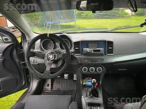 Pelēks Mitsubishi lancer-evolution 2010 Rīga, ar dzinēja tilpumu 2.00 L un nobraukumu 150 tūkst. km par 24000 €, foto 11 vietnē AUTOMOTO.COM.LV