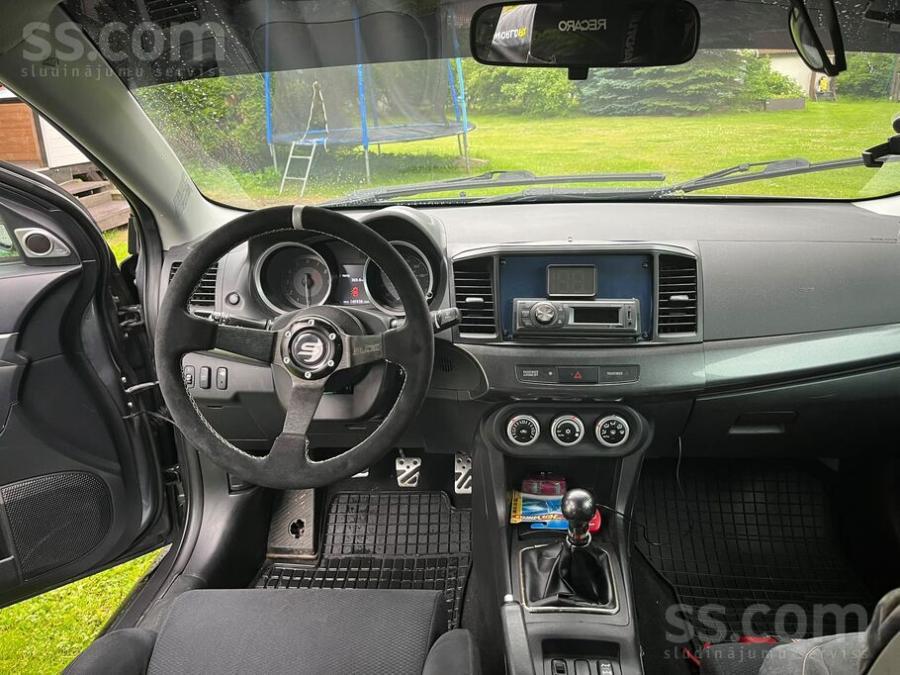 Pelēks Mitsubishi lancer-evolution 2010 Rīga, ar dzinēja tilpumu 2.00 L un nobraukumu 150 tūkst. km par 24000 €, foto 11 vietnē AUTOMOTO.COM.LV