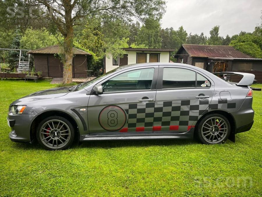 Pelēks Mitsubishi lancer-evolution 2010 Rīga, ar dzinēja tilpumu 2.00 L un nobraukumu 150 tūkst. km par 24000 €, foto 12 vietnē AUTOMOTO.COM.LV