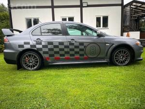 Pelēks Mitsubishi lancer-evolution 2010 Rīga, ar dzinēja tilpumu 2.00 L un nobraukumu 150 tūkst. km par 24000 €, foto 13 vietnē AUTOMOTO.COM.LV