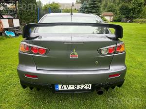 Pelēks Mitsubishi lancer-evolution 2010 Rīga, ar dzinēja tilpumu 2.00 L un nobraukumu 150 tūkst. km par 24000 €, foto 14 vietnē AUTOMOTO.COM.LV