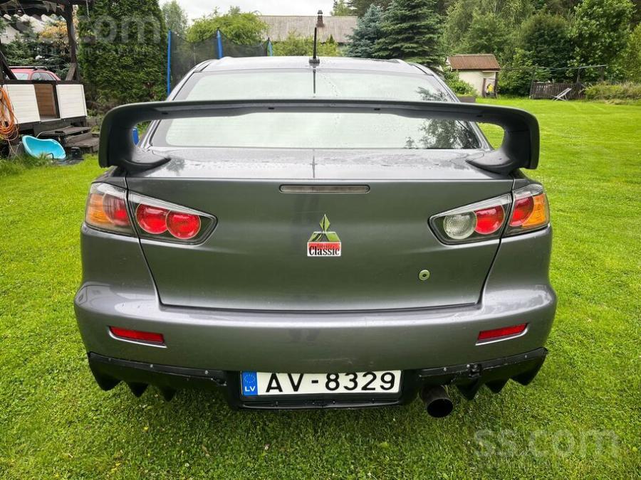 Pelēks Mitsubishi lancer-evolution 2010 Rīga, ar dzinēja tilpumu 2.00 L un nobraukumu 150 tūkst. km par 24000 €, foto 14 vietnē AUTOMOTO.COM.LV