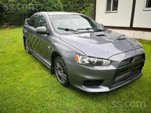 Pelēks Mitsubishi lancer-evolution 2010 Rīga, ar dzinēja tilpumu 2.00 L un nobraukumu 150 tūkst. km par 24000 €, foto 15 vietnē AUTOMOTO.COM.LV