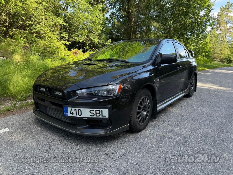 Grey Mitsubishi lancer-evolution 2011 in Tallinn, with an engine capacity of 2.00 L and mileage of 254 thousand km for 26900 €, photo 1 on AUTOMOTO.COM.LV