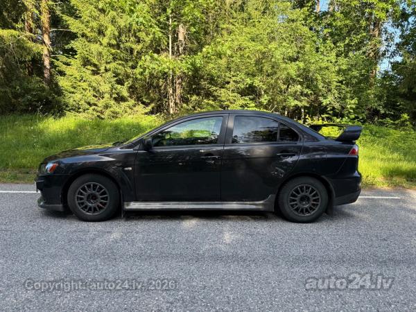 Pelēks Mitsubishi lancer-evolution 2011 Tallina, ar dzinēja tilpumu 2.00 L un nobraukumu 254 tūkst. km par 26900 €, foto 3 vietnē AUTOMOTO.COM.LV