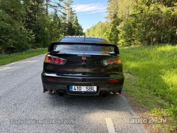 Pelēks Mitsubishi lancer-evolution 2011 Tallina, ar dzinēja tilpumu 2.00 L un nobraukumu 254 tūkst. km par 26900 €, foto 5 vietnē AUTOMOTO.COM.LV