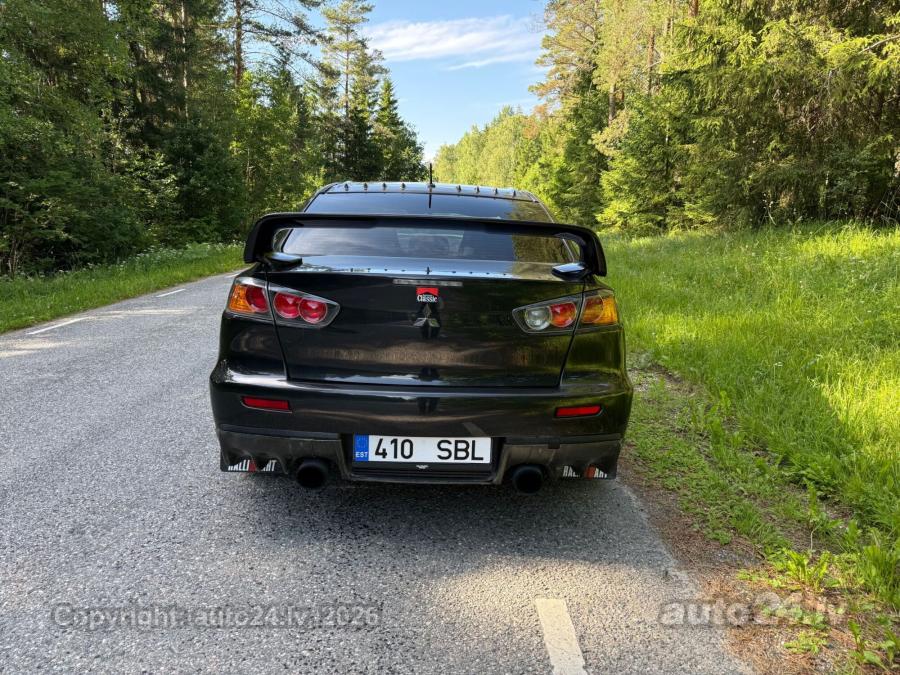 Grey Mitsubishi lancer-evolution 2011 in Tallinn, with an engine capacity of 2.00 L and mileage of 254 thousand km for 26900 €, photo 6 on AUTOMOTO.COM.LV