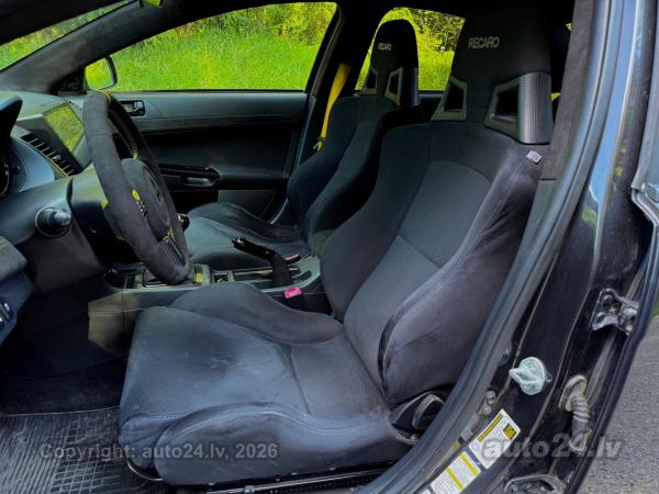 Pelēks Mitsubishi lancer-evolution 2011 Tallina, ar dzinēja tilpumu 2.00 L un nobraukumu 254 tūkst. km par 26900 €, foto 8 vietnē AUTOMOTO.COM.LV