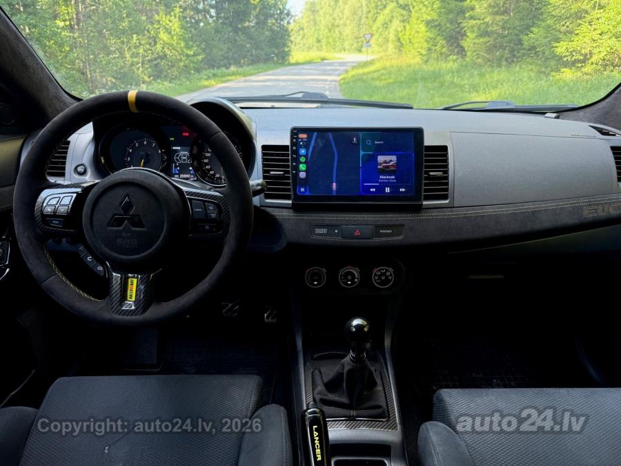 Grey Mitsubishi lancer-evolution 2011 in Tallinn, with an engine capacity of 2.00 L and mileage of 254 thousand km for 26900 €, photo 10 on AUTOMOTO.COM.LV