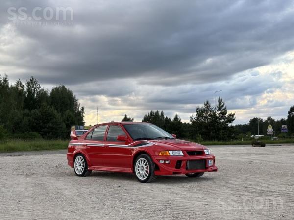 Red Mitsubishi lancer-evolution 1999 in Riga, with an engine capacity of 2.00 L and mileage of 141 thousand km for 47000 €, photo 1 on AUTOMOTO.COM.LV