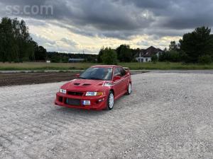 Red Mitsubishi lancer-evolution 1999 in Riga, with an engine capacity of 2.00 L and mileage of 141 thousand km for 47000 €, photo 2 on AUTOMOTO.COM.LV