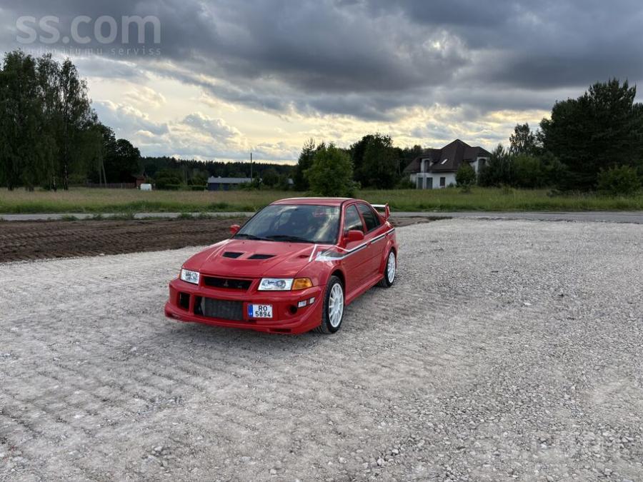 Red Mitsubishi lancer-evolution 1999 in Riga, with an engine capacity of 2.00 L and mileage of 141 thousand km for 47000 €, photo 2 on AUTOMOTO.COM.LV