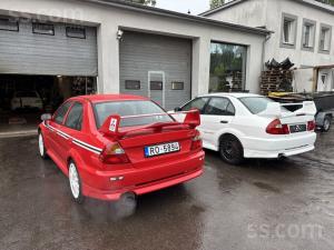 Red Mitsubishi lancer-evolution 1999 in Riga, with an engine capacity of 2.00 L and mileage of 141 thousand km for 47000 €, photo 3 on AUTOMOTO.COM.LV