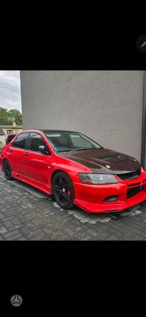 Red Mitsubishi lancer-evolution 2002 in Kaunas, with an engine capacity of 2.00 L and mileage of 135 thousand km for 13500 €, photo  on AUTOMOTO.COM.LV