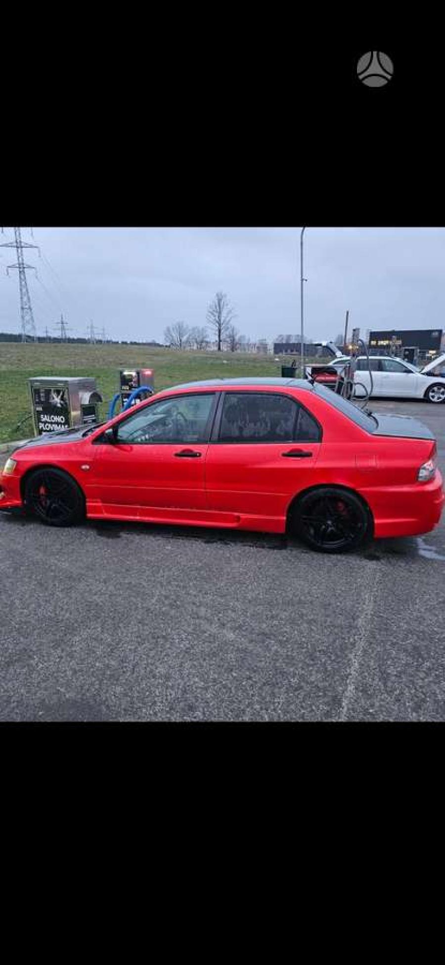 Red Mitsubishi lancer-evolution 2002 in Kaunas, with an engine capacity of 2.00 L and mileage of 135 thousand km for 13500 €, photo 5 on AUTOMOTO.COM.LV