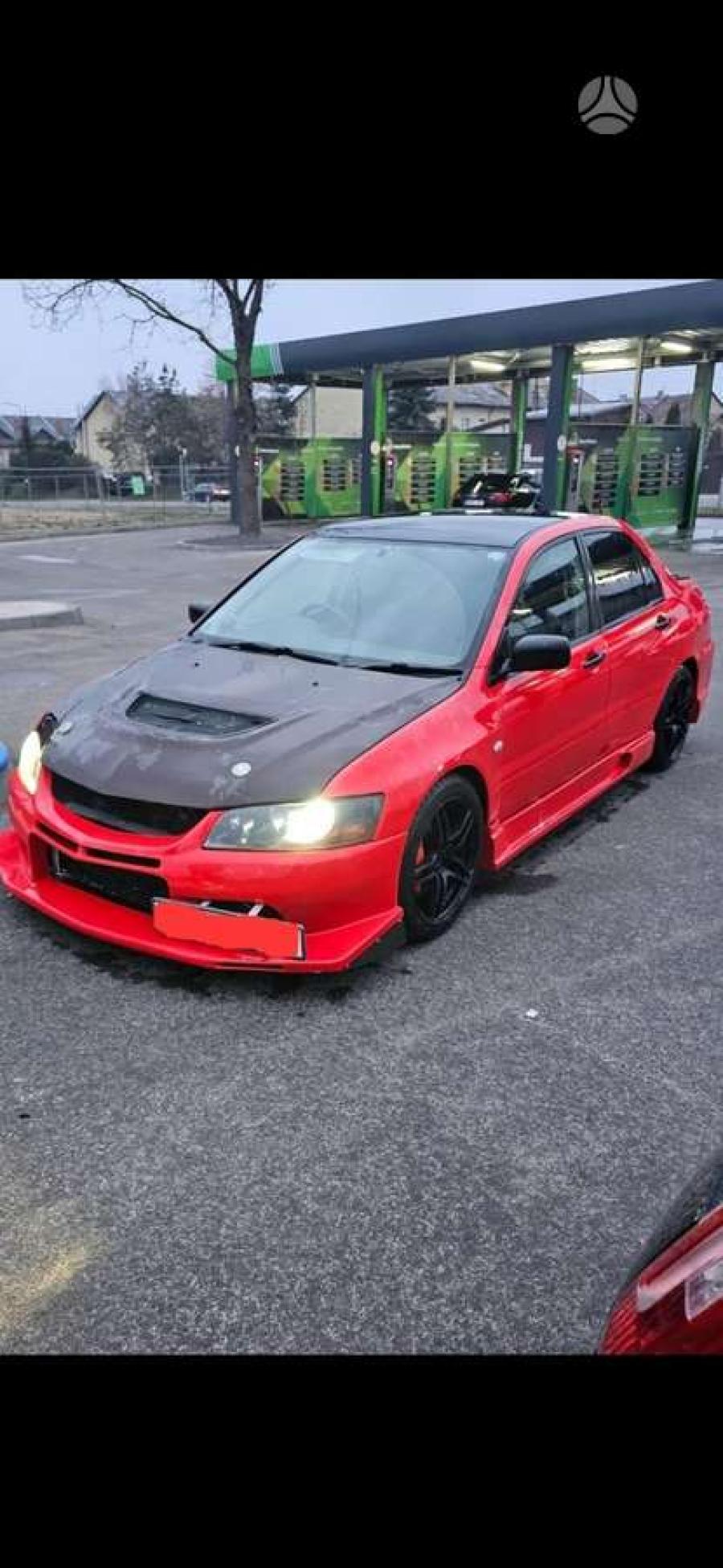 Red Mitsubishi lancer-evolution 2002 in Kaunas, with an engine capacity of 2.00 L and mileage of 135 thousand km for 13500 €, photo 6 on AUTOMOTO.COM.LV
