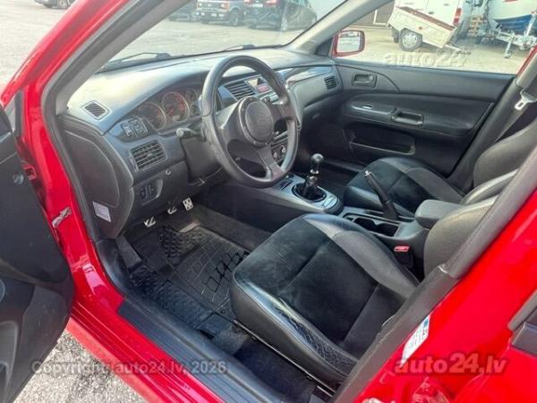 Sarkans Mitsubishi lancer-evolution 2006 Tartu, ar dzinēja tilpumu 2.00 L un nobraukumu 197 tūkst. km par 35000 €, foto 6 vietnē AUTOMOTO.COM.LV