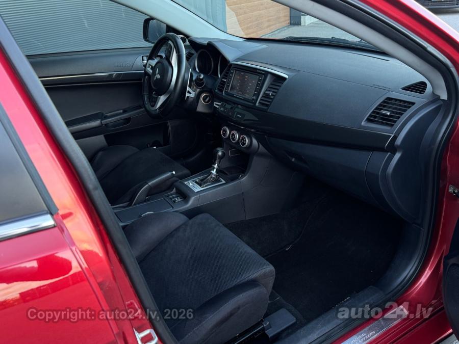 Red Mitsubishi lancer-evolution 2008 in Tallinn, with an engine capacity of 2.00 L and mileage of 179 thousand km for 15000 €, photo 6 on AUTOMOTO.COM.LV
