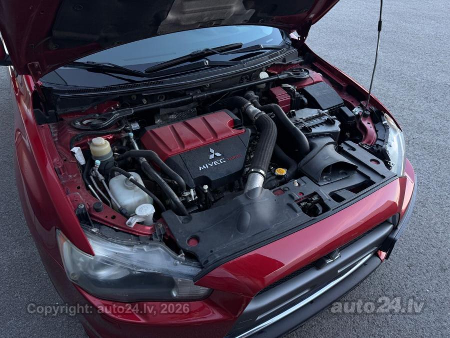 Red Mitsubishi lancer-evolution 2008 in Tallinn, with an engine capacity of 2.00 L and mileage of 179 thousand km for 15000 €, photo 9 on AUTOMOTO.COM.LV