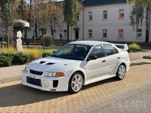 Balts Mitsubishi lancer-evolution 1998 Rīga, ar dzinēja tilpumu 2.00 L un nobraukumu 59 tūkst. km par 69500 €, foto  vietnē AUTOMOTO.COM.LV
