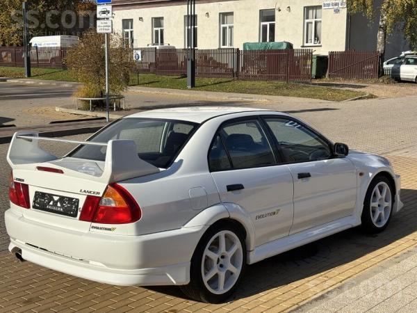 White Mitsubishi lancer-evolution 1998 in Riga, with an engine capacity of 2.00 L and mileage of 59 thousand km for 69500 €, photo 3 on AUTOMOTO.COM.LV