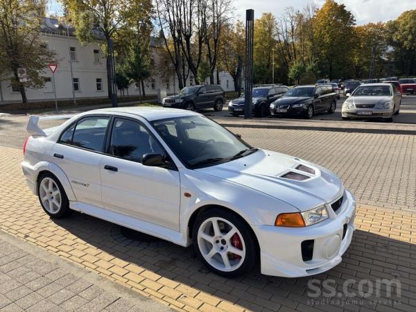 White Mitsubishi lancer-evolution 1998 in Riga, with an engine capacity of 2.00 L and mileage of 59 thousand km for 69500 €, photo 4 on AUTOMOTO.COM.LV