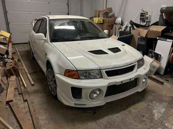 White Mitsubishi lancer-evolution 1998 in Panevezys, with an engine capacity of 2.00 L and mileage of 131 thousand km for 27000 €, photo 2 on AUTOMOTO.COM.LV