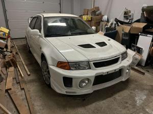 White Mitsubishi lancer-evolution 1998 in Panevezys, with an engine capacity of 2.00 L and mileage of 131 thousand km for 27000 €, photo 3 on AUTOMOTO.COM.LV