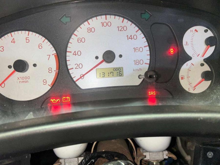 White Mitsubishi lancer-evolution 1998 in Panevezys, with an engine capacity of 2.00 L and mileage of 131 thousand km for 27000 €, photo 7 on AUTOMOTO.COM.LV