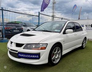 Balts Mitsubishi lancer-evolution 2003 Panevēža, ar dzinēja tilpumu 2.00 L un nobraukumu 107 tūkst. km par 31500 €, foto  vietnē AUTOMOTO.COM.LV