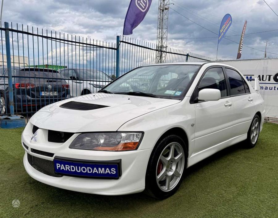 Balts Mitsubishi lancer-evolution 2003 Panevēža, ar dzinēja tilpumu 2.00 L un nobraukumu 107 tūkst. km par 31500 €, foto 1 vietnē AUTOMOTO.COM.LV