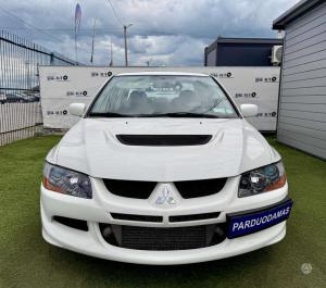Balts Mitsubishi lancer-evolution 2003 Panevēža, ar dzinēja tilpumu 2.00 L un nobraukumu 107 tūkst. km par 31500 €, foto 3 vietnē AUTOMOTO.COM.LV