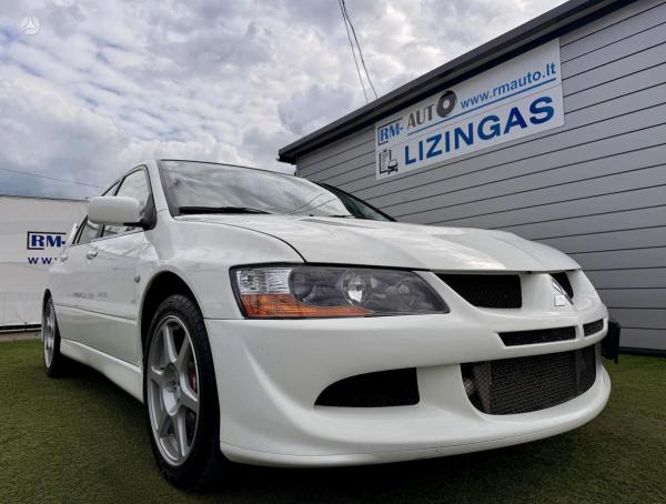 Balts Mitsubishi lancer-evolution 2003 Panevēža, ar dzinēja tilpumu 2.00 L un nobraukumu 107 tūkst. km par 31500 €, foto 4 vietnē AUTOMOTO.COM.LV