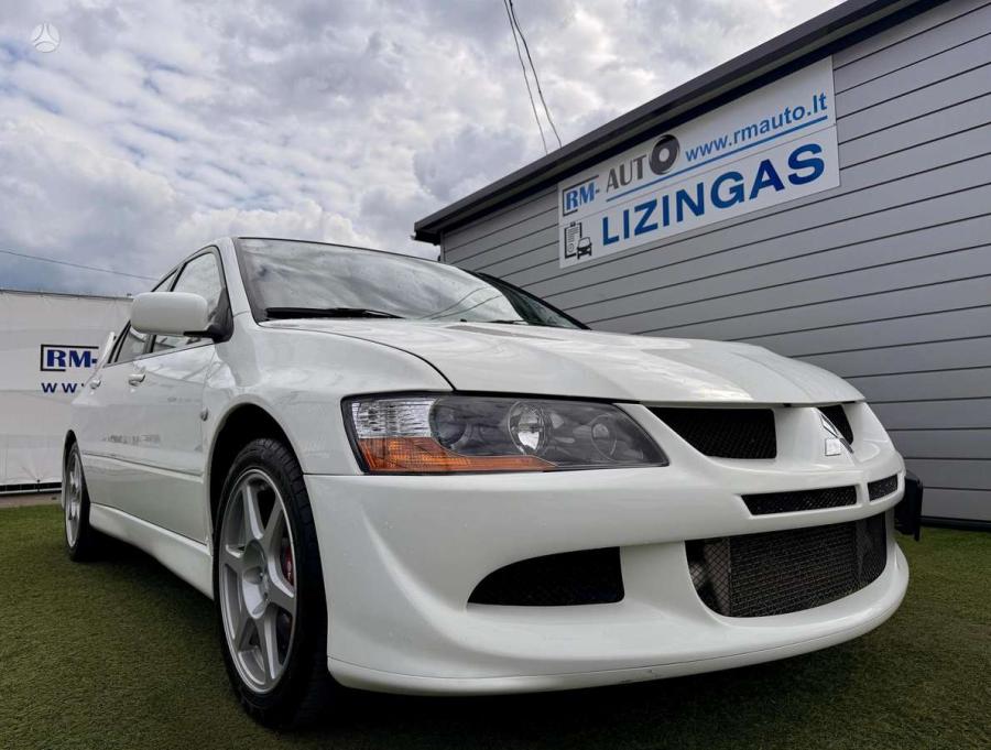 Balts Mitsubishi lancer-evolution 2003 Panevēža, ar dzinēja tilpumu 2.00 L un nobraukumu 107 tūkst. km par 31500 €, foto 5 vietnē AUTOMOTO.COM.LV