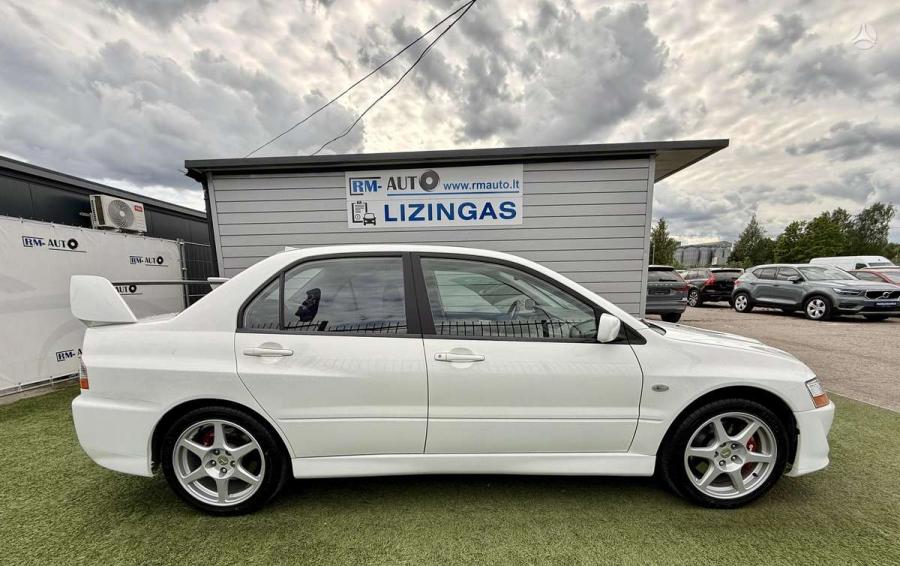 Balts Mitsubishi lancer-evolution 2003 Panevēža, ar dzinēja tilpumu 2.00 L un nobraukumu 107 tūkst. km par 31500 €, foto 6 vietnē AUTOMOTO.COM.LV