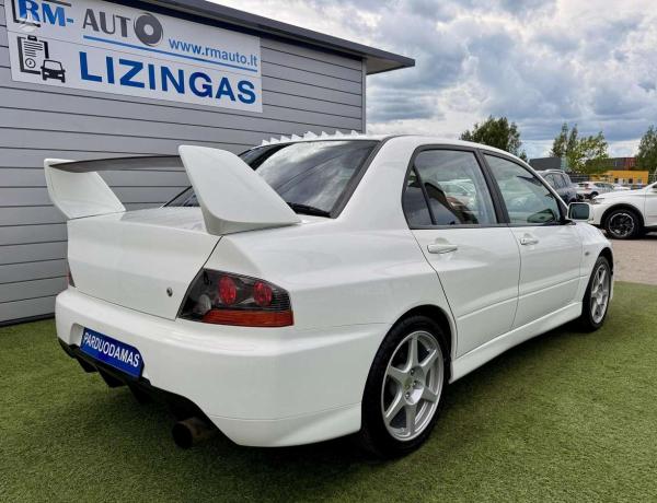 Balts Mitsubishi lancer-evolution 2003 Panevēža, ar dzinēja tilpumu 2.00 L un nobraukumu 107 tūkst. km par 31500 €, foto 6 vietnē AUTOMOTO.COM.LV