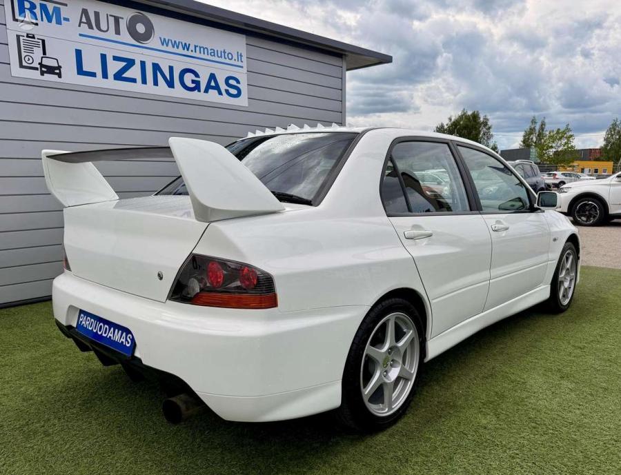 Balts Mitsubishi lancer-evolution 2003 Panevēža, ar dzinēja tilpumu 2.00 L un nobraukumu 107 tūkst. km par 31500 €, foto 7 vietnē AUTOMOTO.COM.LV