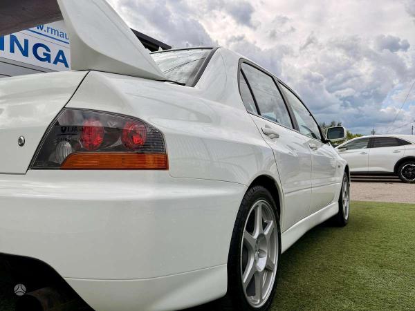 Balts Mitsubishi lancer-evolution 2003 Panevēža, ar dzinēja tilpumu 2.00 L un nobraukumu 107 tūkst. km par 31500 €, foto 8 vietnē AUTOMOTO.COM.LV