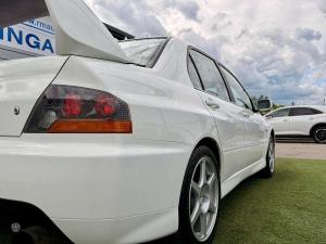Balts Mitsubishi lancer-evolution 2003 Panevēža, ar dzinēja tilpumu 2.00 L un nobraukumu 107 tūkst. km par 31500 €, foto 9 vietnē AUTOMOTO.COM.LV