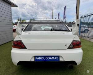 Balts Mitsubishi lancer-evolution 2003 Panevēža, ar dzinēja tilpumu 2.00 L un nobraukumu 107 tūkst. km par 31500 €, foto 10 vietnē AUTOMOTO.COM.LV