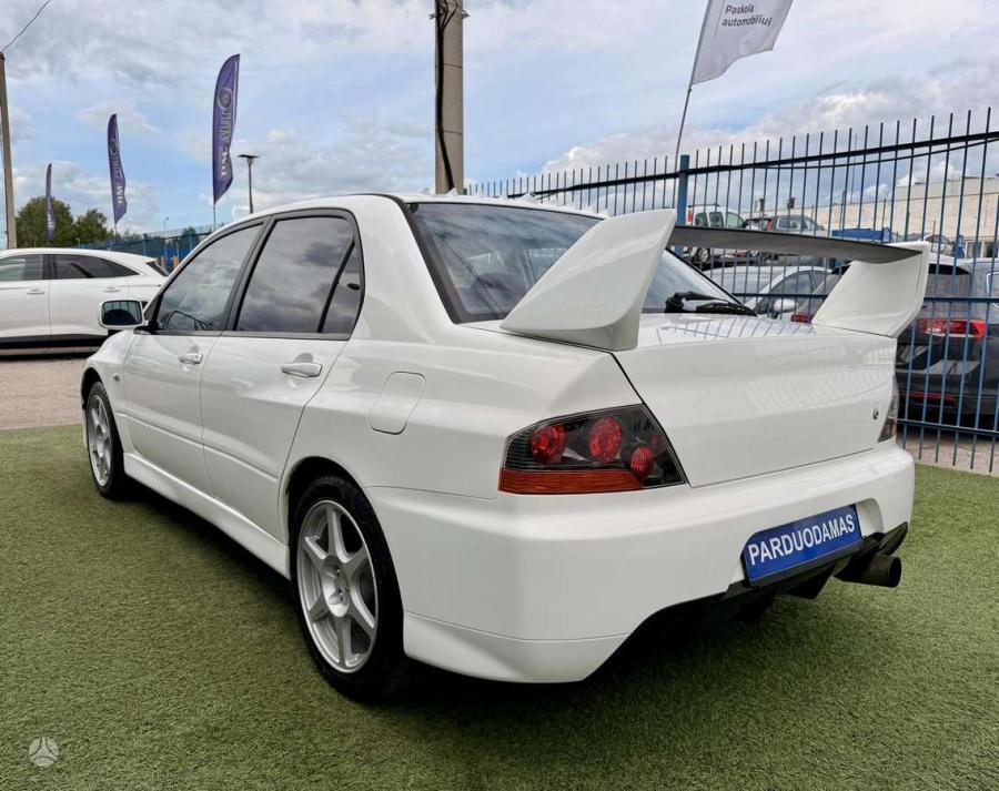 Balts Mitsubishi lancer-evolution 2003 Panevēža, ar dzinēja tilpumu 2.00 L un nobraukumu 107 tūkst. km par 31500 €, foto 11 vietnē AUTOMOTO.COM.LV