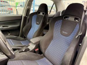Balts Mitsubishi lancer-evolution 2003 Panevēža, ar dzinēja tilpumu 2.00 L un nobraukumu 107 tūkst. km par 31500 €, foto 16 vietnē AUTOMOTO.COM.LV