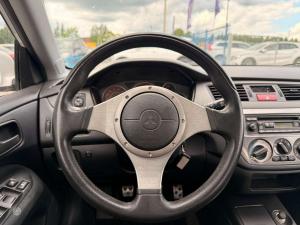Balts Mitsubishi lancer-evolution 2003 Panevēža, ar dzinēja tilpumu 2.00 L un nobraukumu 107 tūkst. km par 31500 €, foto 20 vietnē AUTOMOTO.COM.LV