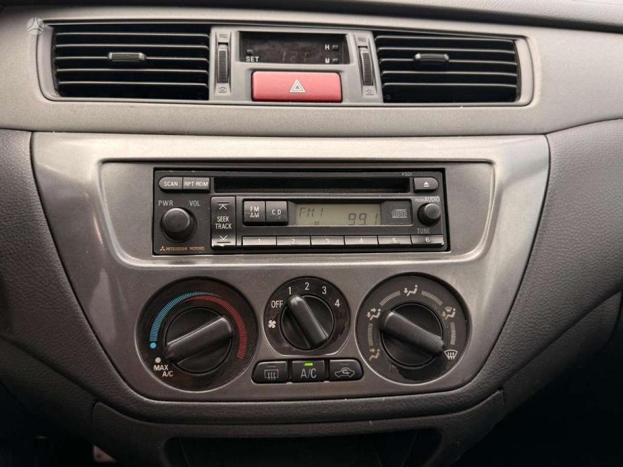 Balts Mitsubishi lancer-evolution 2003 Panevēža, ar dzinēja tilpumu 2.00 L un nobraukumu 107 tūkst. km par 31500 €, foto 22 vietnē AUTOMOTO.COM.LV