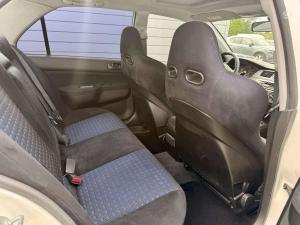 Balts Mitsubishi lancer-evolution 2003 Panevēža, ar dzinēja tilpumu 2.00 L un nobraukumu 107 tūkst. km par 31500 €, foto 27 vietnē AUTOMOTO.COM.LV