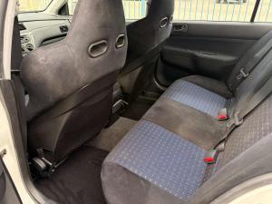 Balts Mitsubishi lancer-evolution 2003 Panevēža, ar dzinēja tilpumu 2.00 L un nobraukumu 107 tūkst. km par 31500 €, foto 28 vietnē AUTOMOTO.COM.LV
